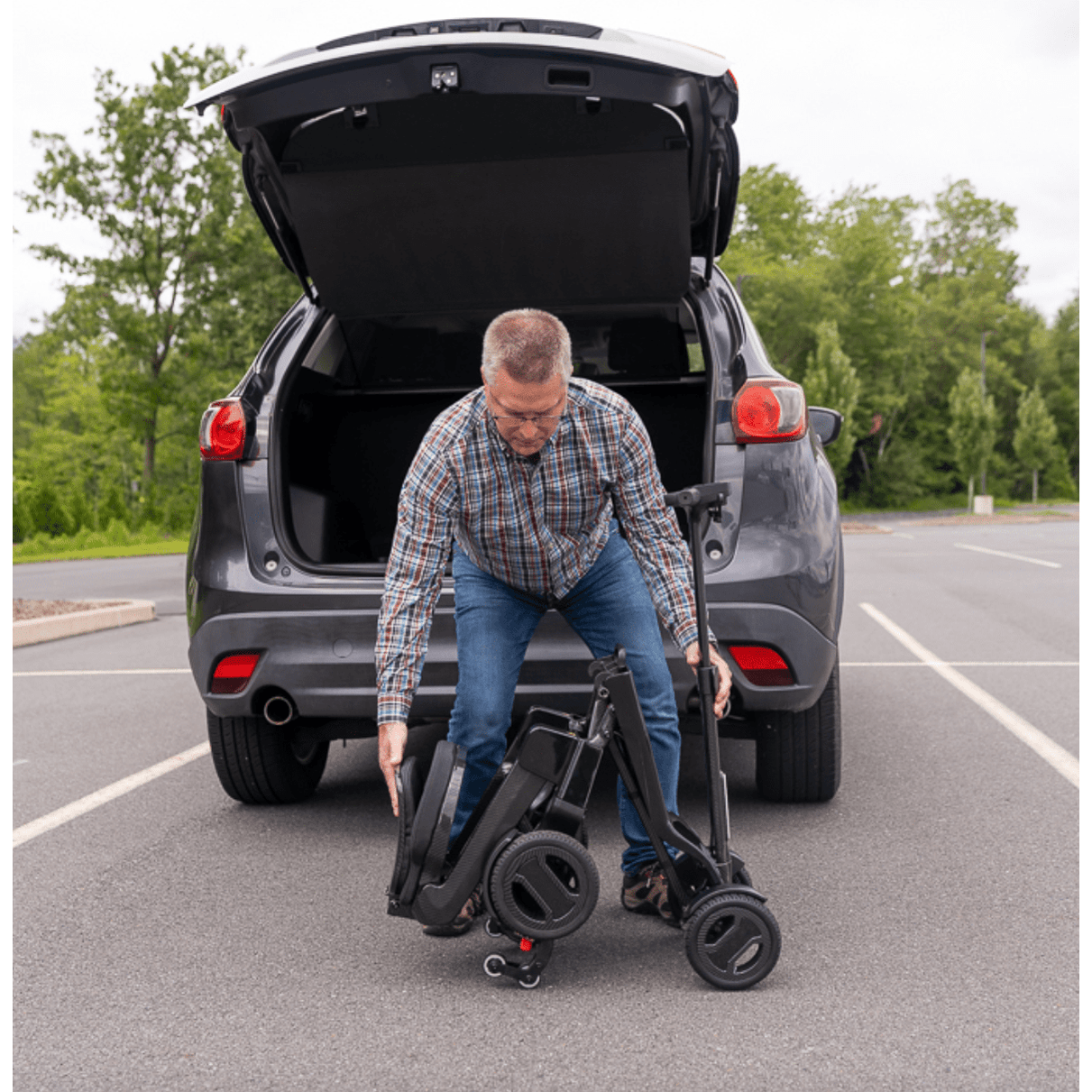 Pride Go Go Carbon Ultra Lightweight Folding Scooter — RestoreMobility